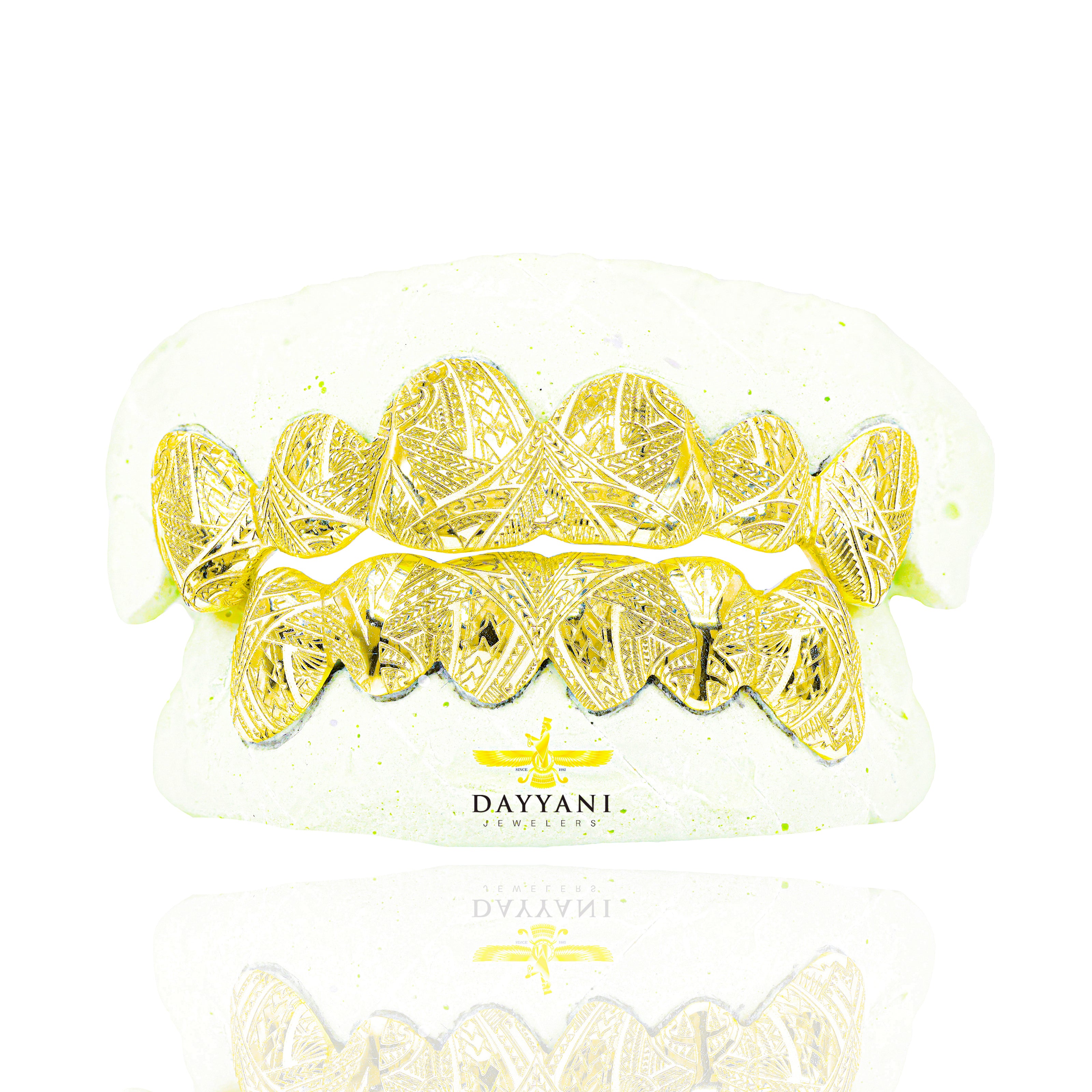 Custom Grillz with Tribal Engravings Gold Grillz