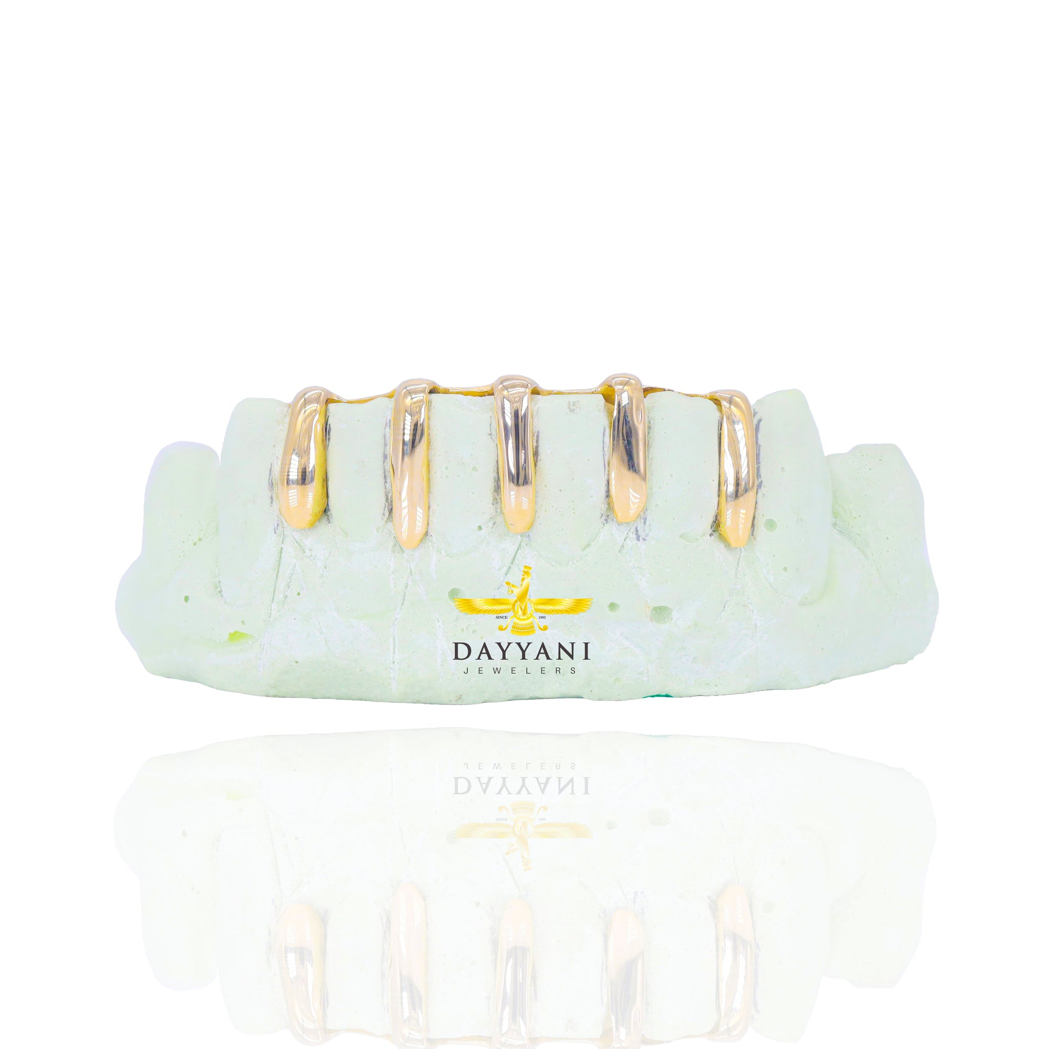 Custom Gap Fillers with Closed Caps Gold Grillz (Pharrell Grillz)